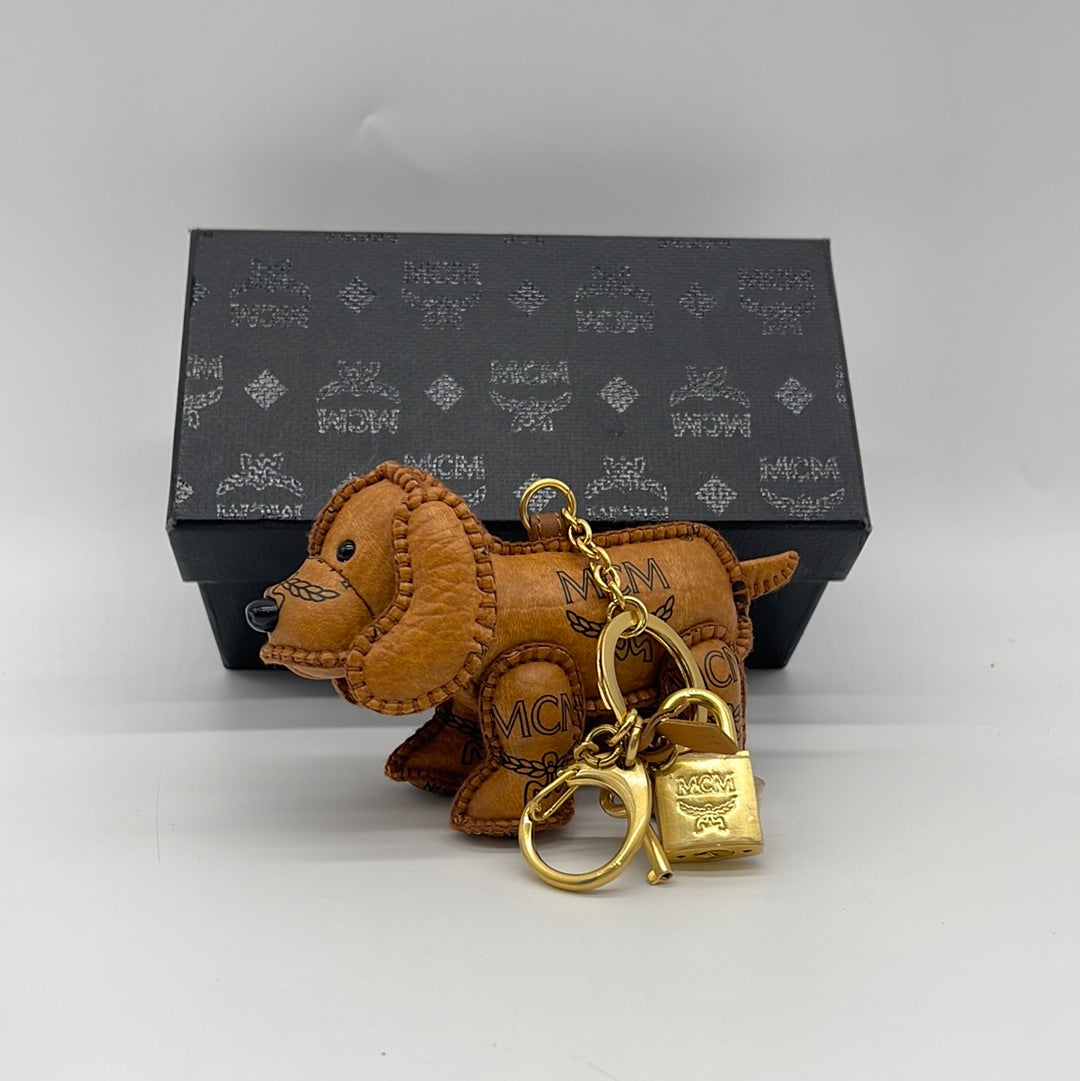 070823 SNEAK PEAK PRELOVED MCM Cognac Dog Bag Charmed 232 100 OFF ...